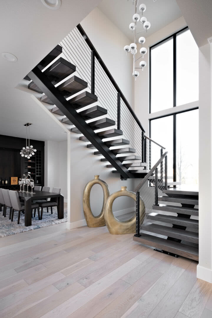 Floating Stairs Make a Dramatic Entry in Amarillo Builder’s Home - KB ...